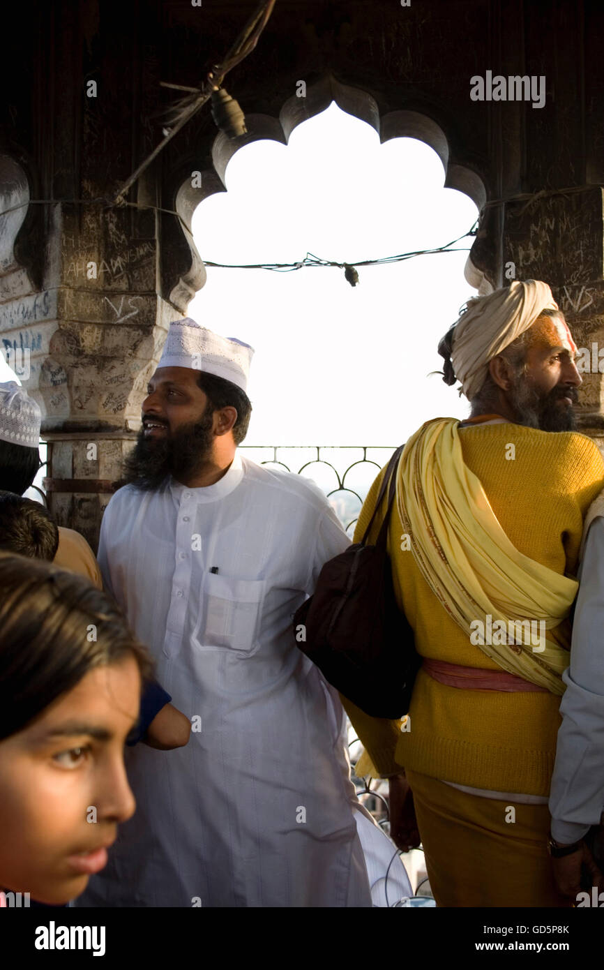 A sadhu and a molvi inside Jama Masjid Stock Photo - Alamy