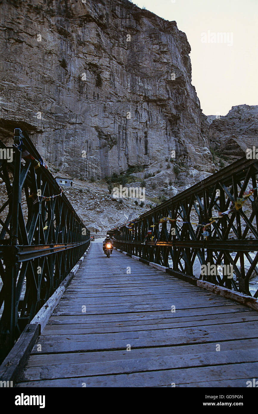 A biker crossing a bridge Stock Photo - Alamy