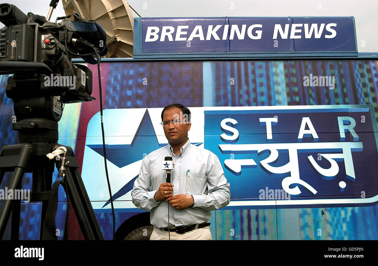 Indian news reporter hi-res stock photography and images - Alamy