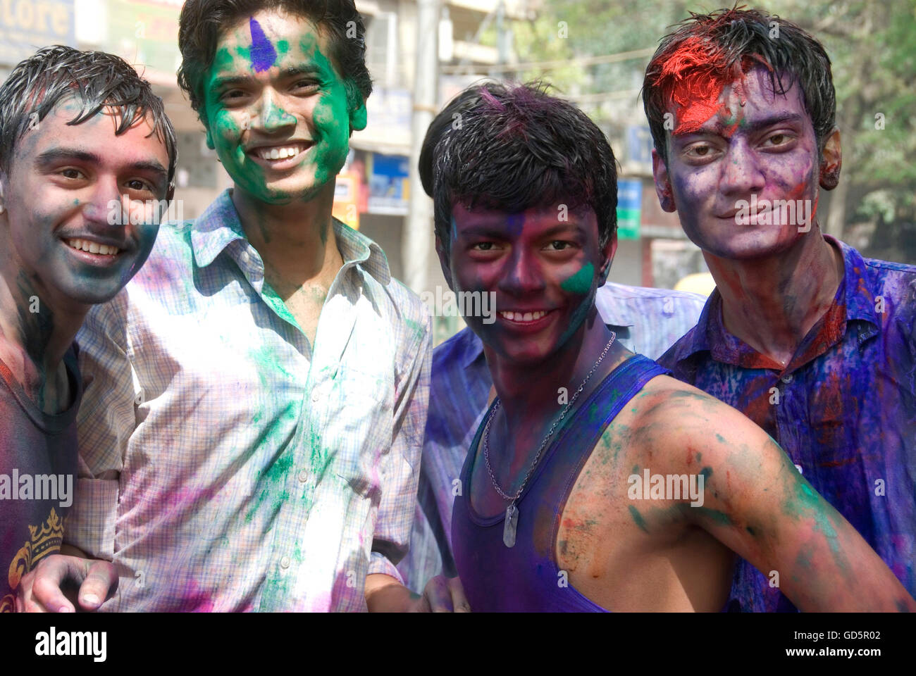 Boys celebrating Holi Stock Photo - Alamy
