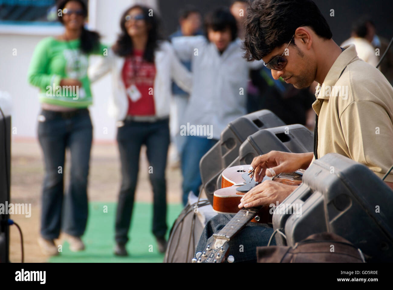 Man playing music Stock Photo - Alamy