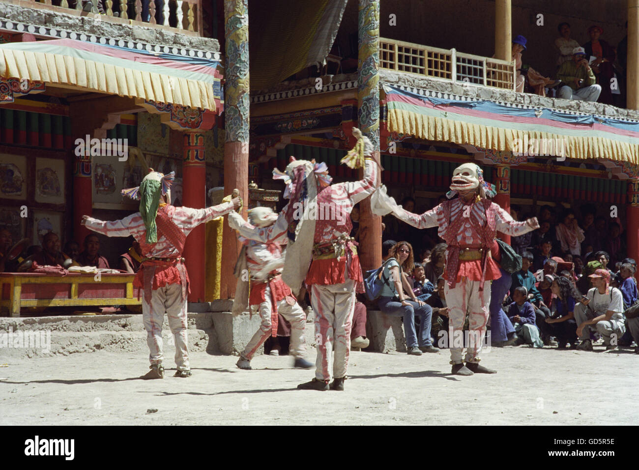 Men performing a traditional dance Stock Photo - Alamy