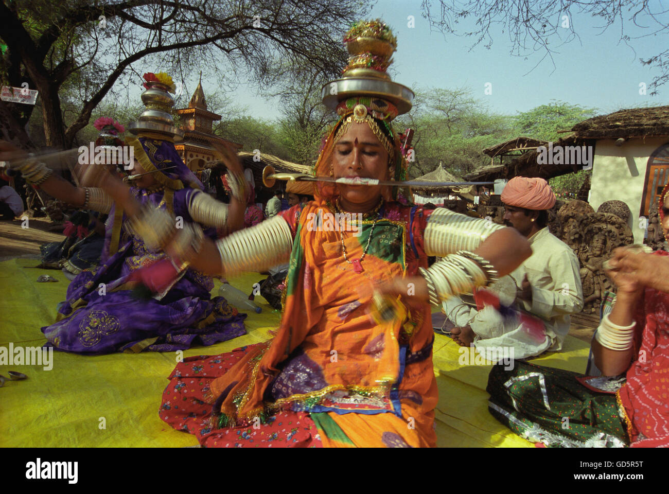 Women performing a traditional dance Stock Photo - Alamy