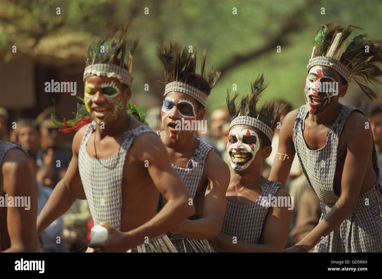 Men performing a traditional dance Stock Photo - Alamy