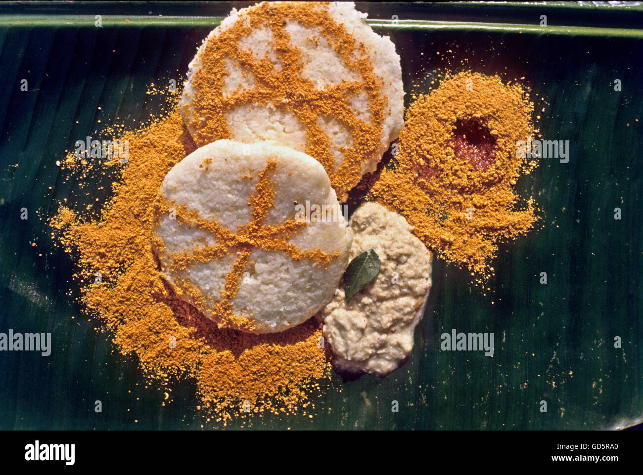 Idli on banana leaf Stock Photo - Alamy