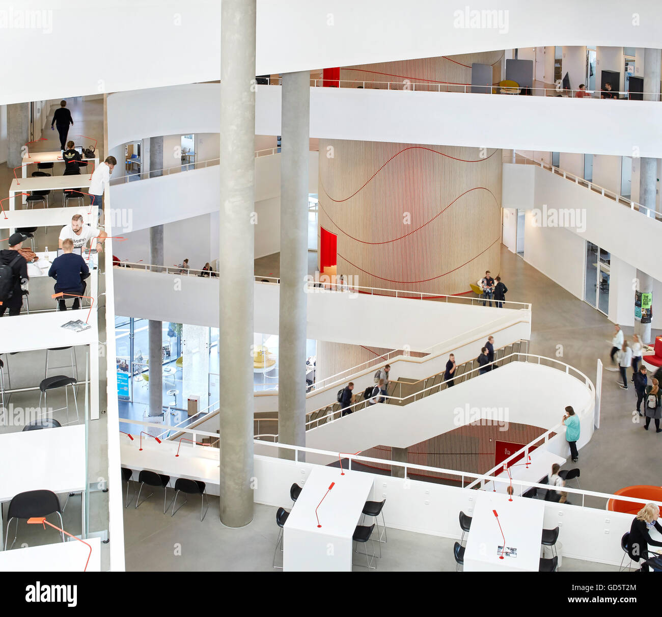 Elevated view through atrium with balconies and staircase. SDU Campus ...