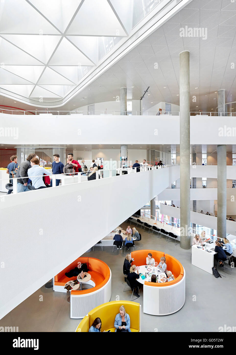 Atrium balconies and curved seating pods. SDU Campus Kolding, Kolding, Denmark. Architect ...