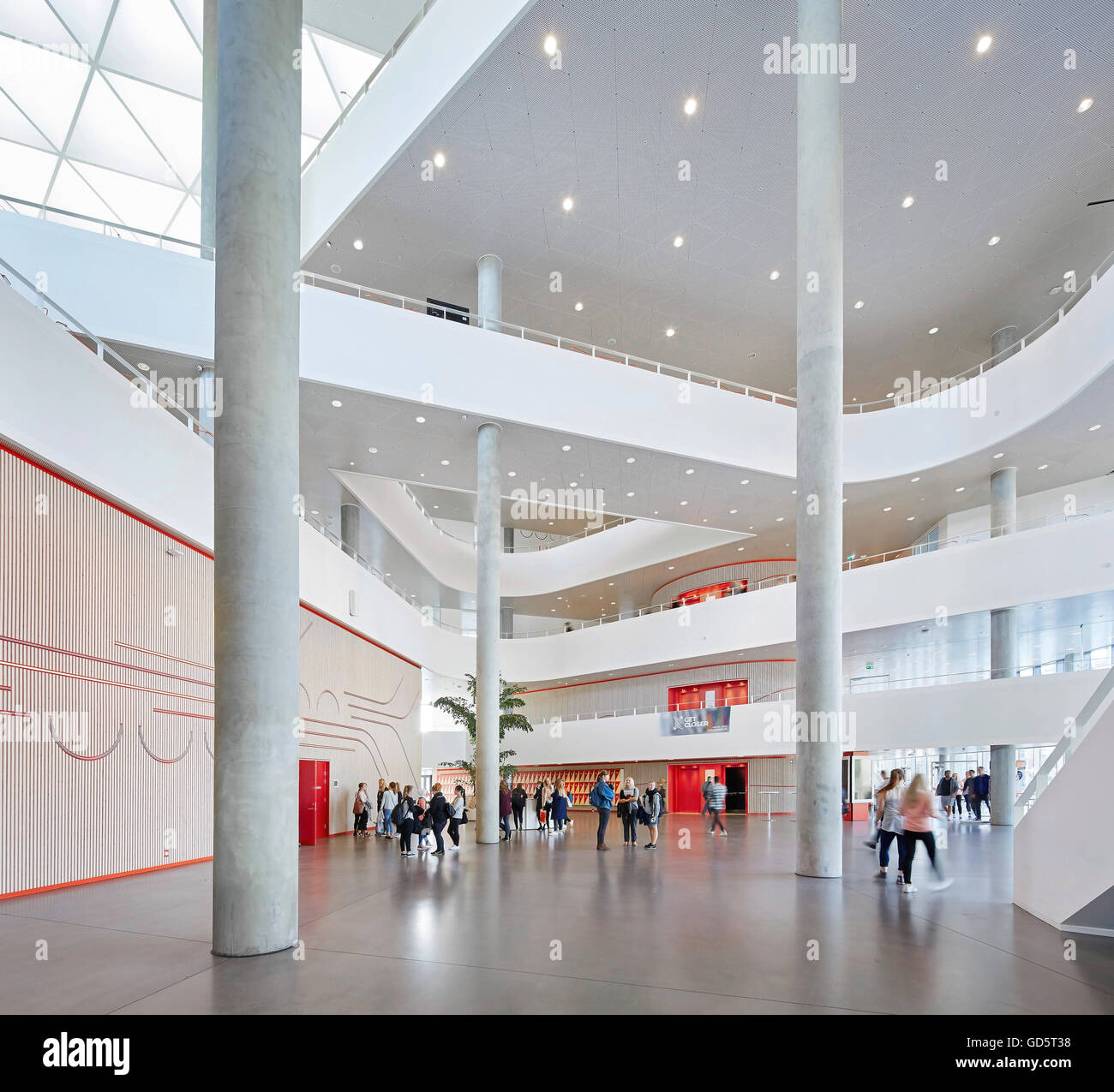 Entrance foyer and multi-storey atrium with balconies and columns. SDU ...