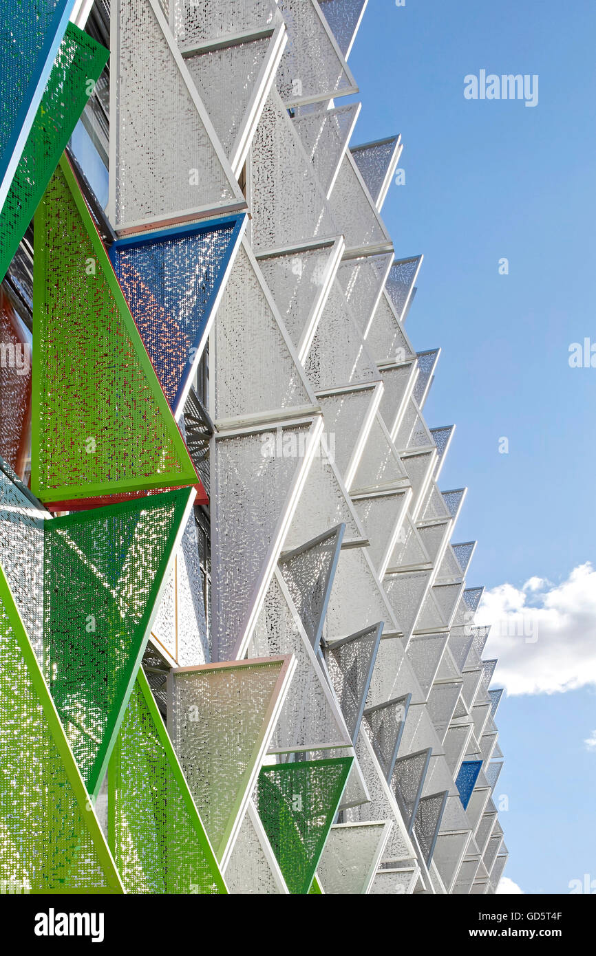 Detail of exterior facade with colorful triangular shutters. SDU Campus ...