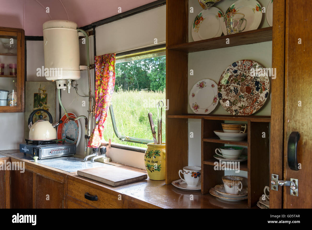 Kitchen area in retro caravan Stock Photo - Alamy
