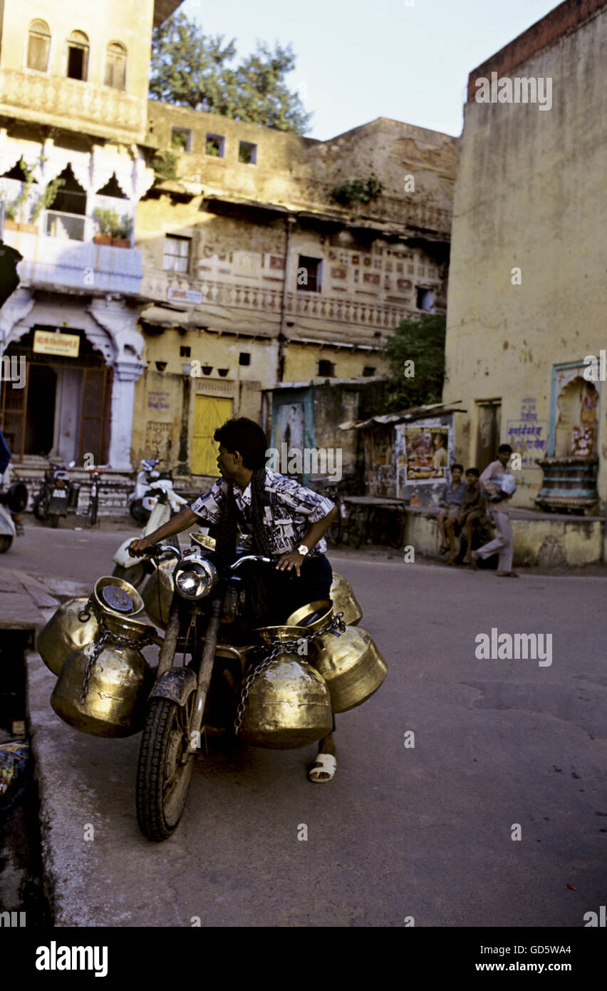 Milkman on the street Stock Photo - Alamy