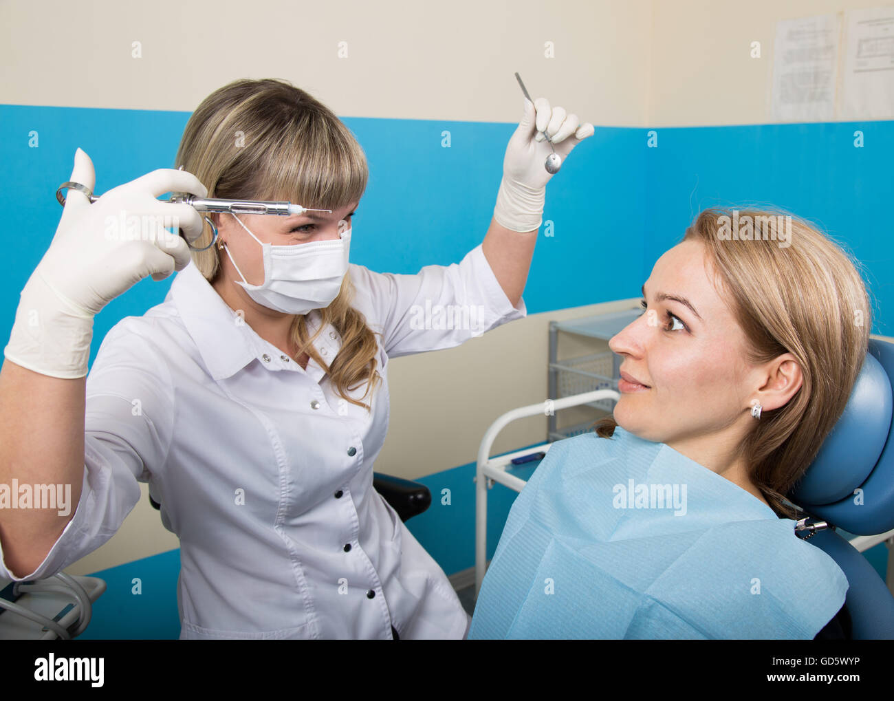 Doctor examines the oral cavity on tooth decay. Caries protection ...