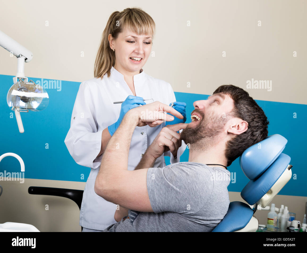Doctor examines the oral cavity on tooth decay. Caries protection ...