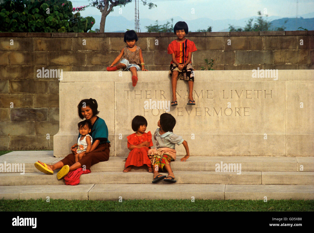 Children playing at a cemetery Stock Photo - Alamy