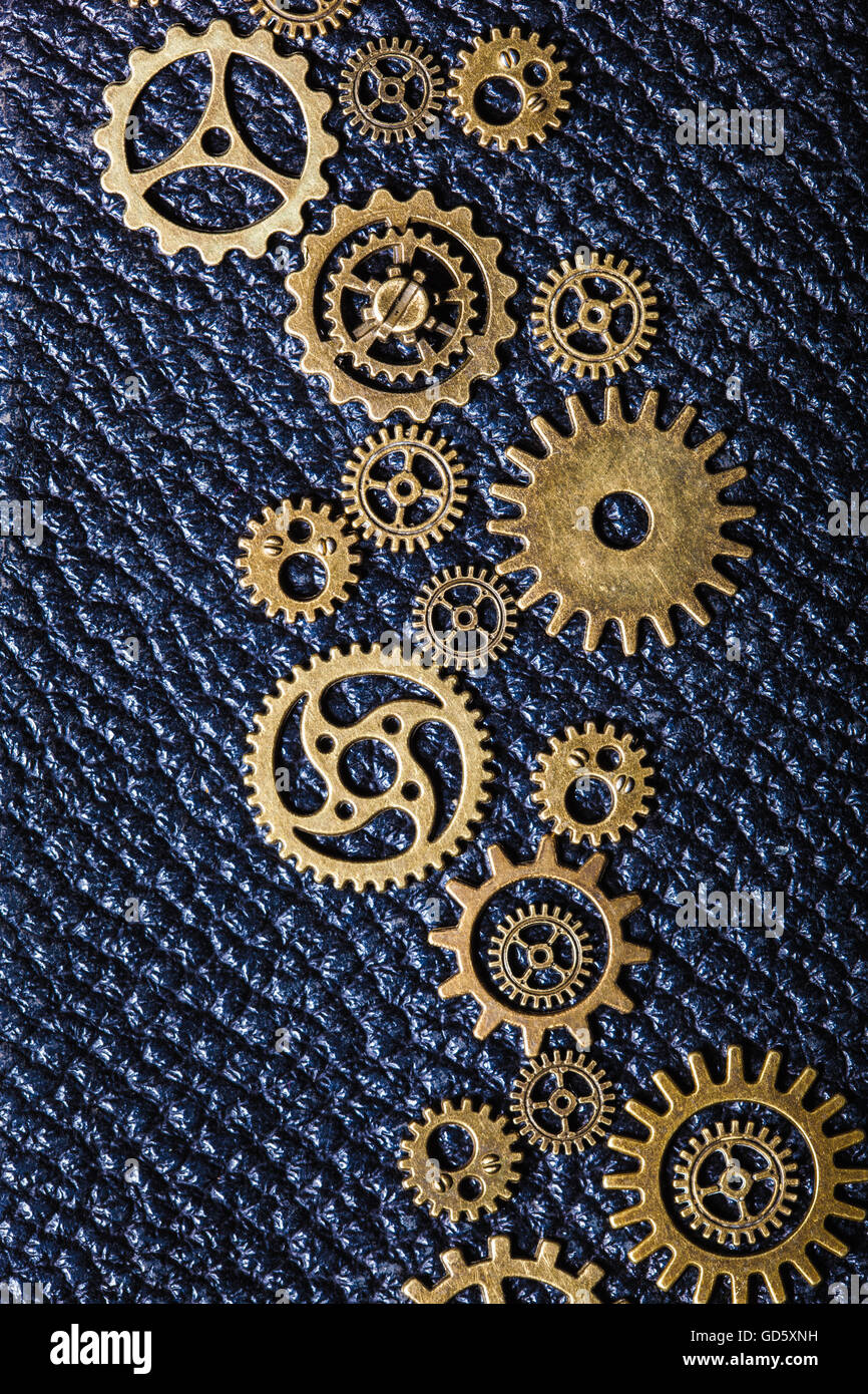 steampunk mechanical cogs gears wheels on leather background Stock ...