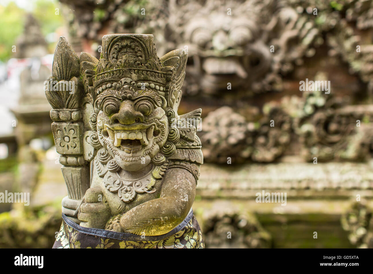Traditional demon guards statue in Bali island Stock Photo - Alamy