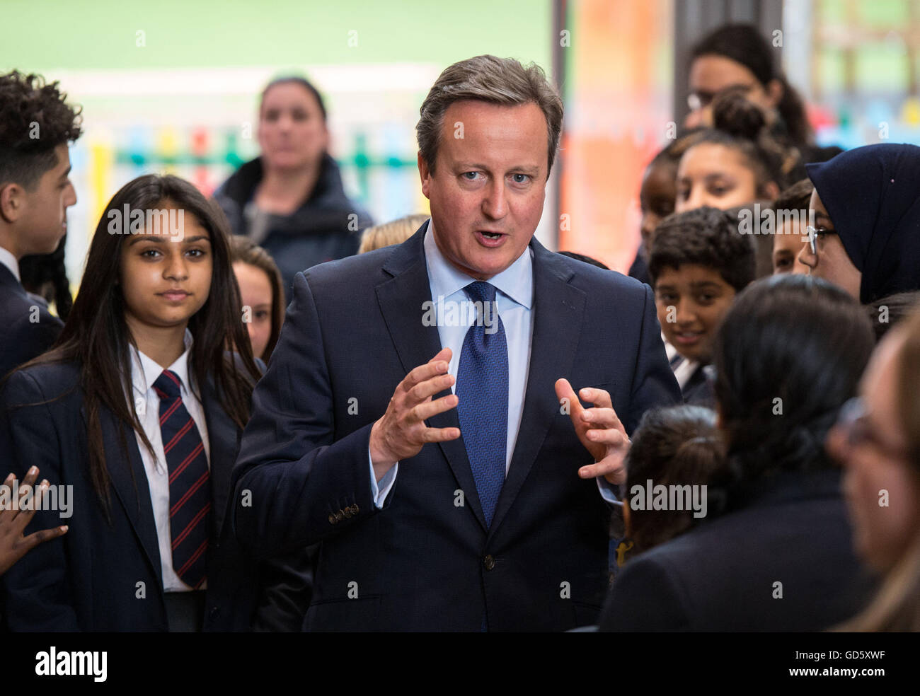 Prime Minister David Cameron meets pupils during a visit to the Reach ...