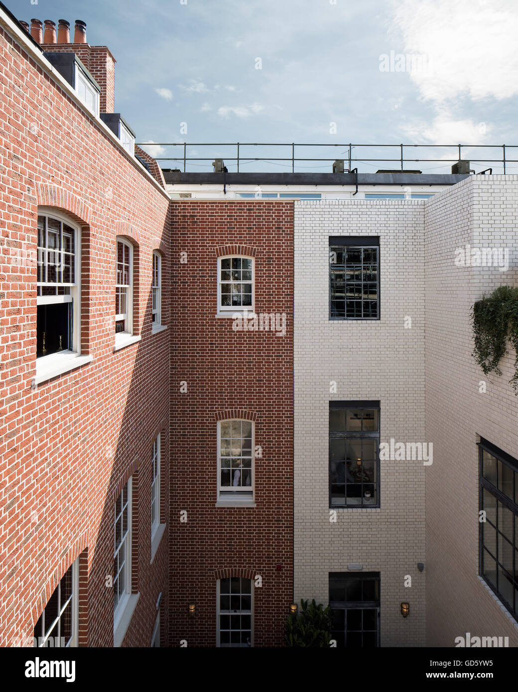 View of old restored building and new building. 76 Dean Street, London ...