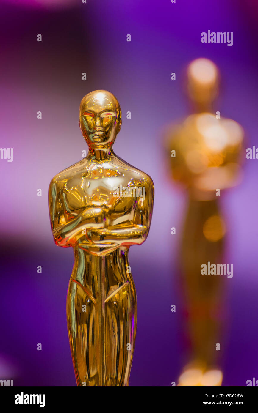 A Shiny Yellow Golden Prize Statue Stock Photo - Alamy