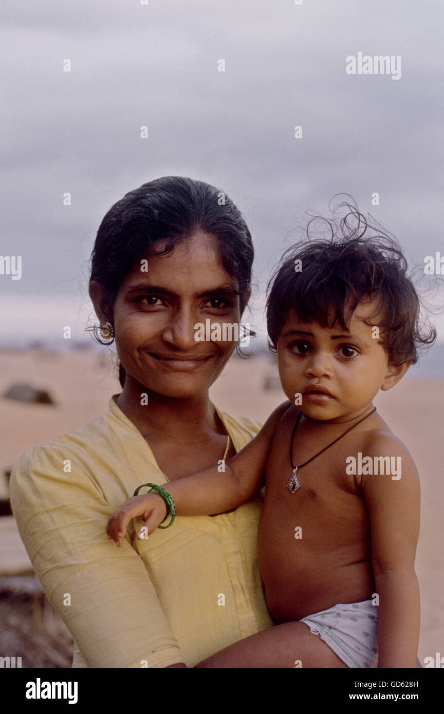 Fisherwoman and child Stock Photo - Alamy