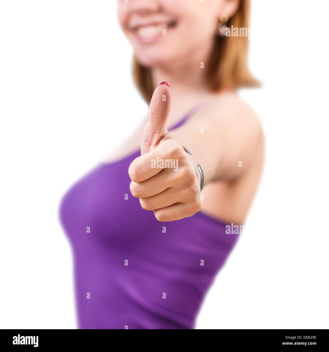 Gorgeous young woman showing big thumbs up Stock Photo - Alamy