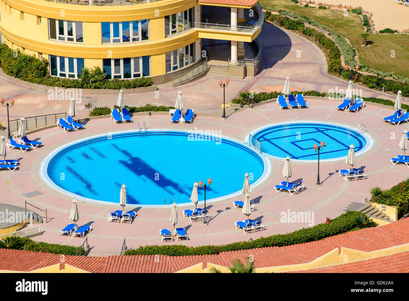 Empty Hotel Swimming Pool Under Sunlight Stock Photo - Alamy