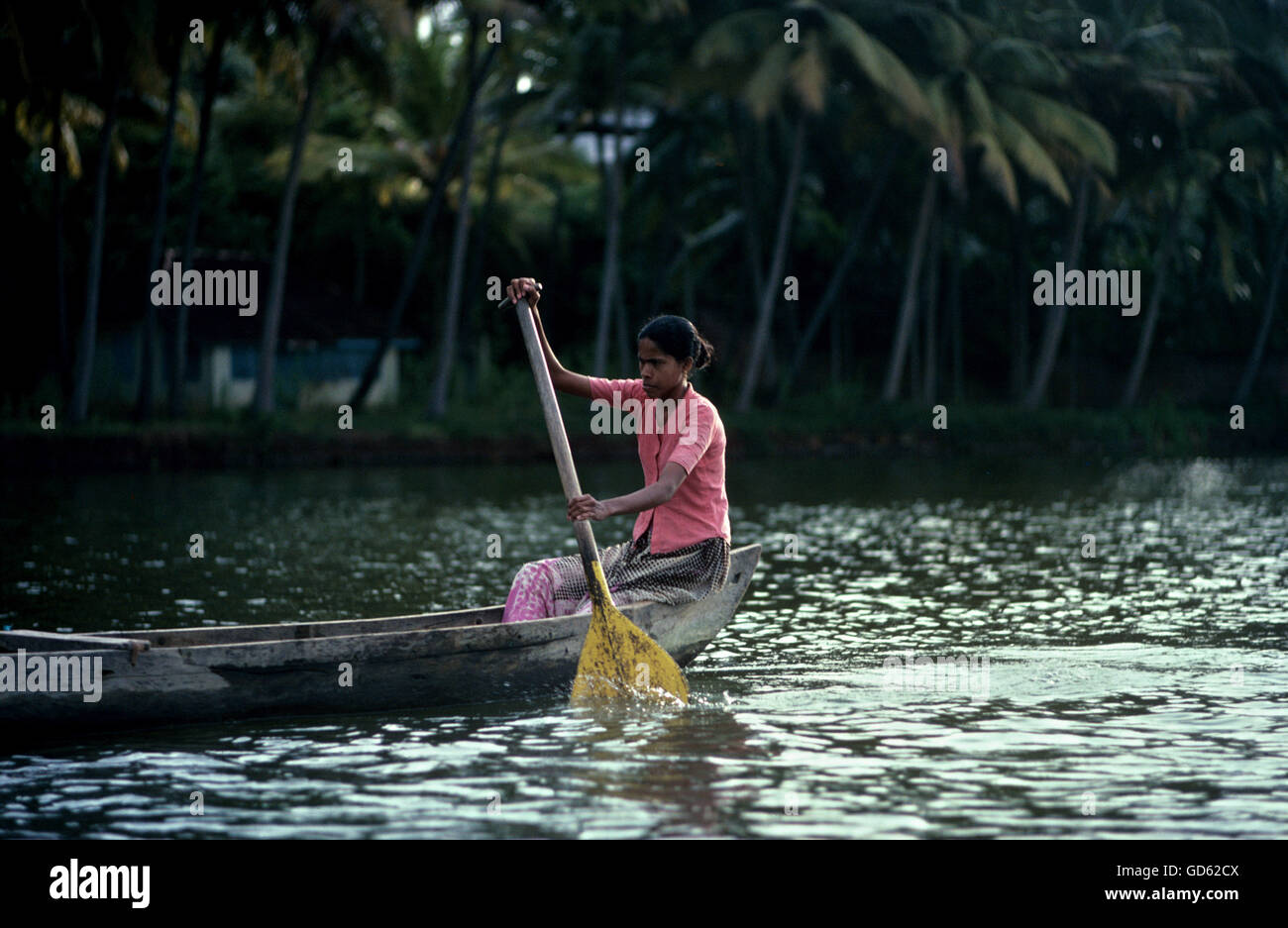 Woman in traditional boat Stock Photo - Alamy