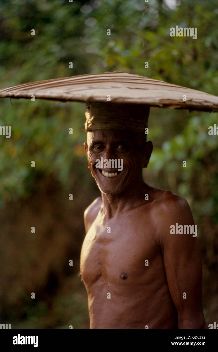 Farmer with Chinese hat Stock Photo - Alamy