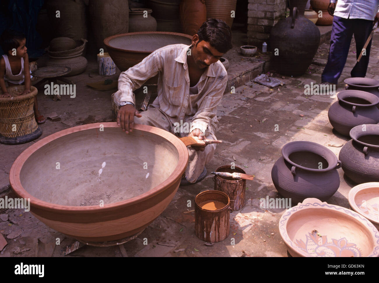 Potter colouring hi-res stock photography and images - Alamy