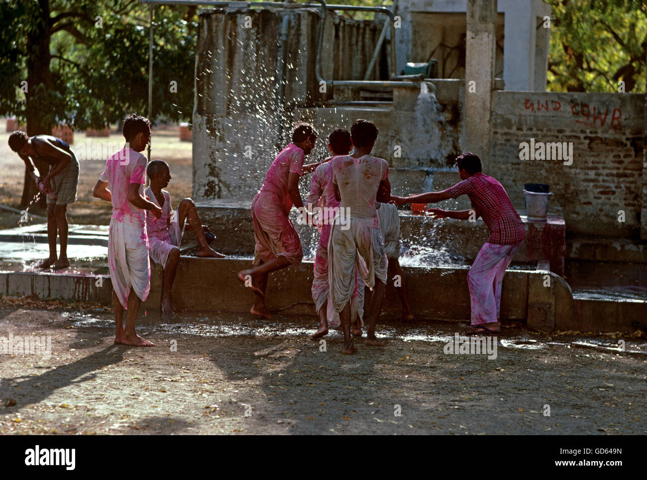 People playing Holi Stock Photo - Alamy
