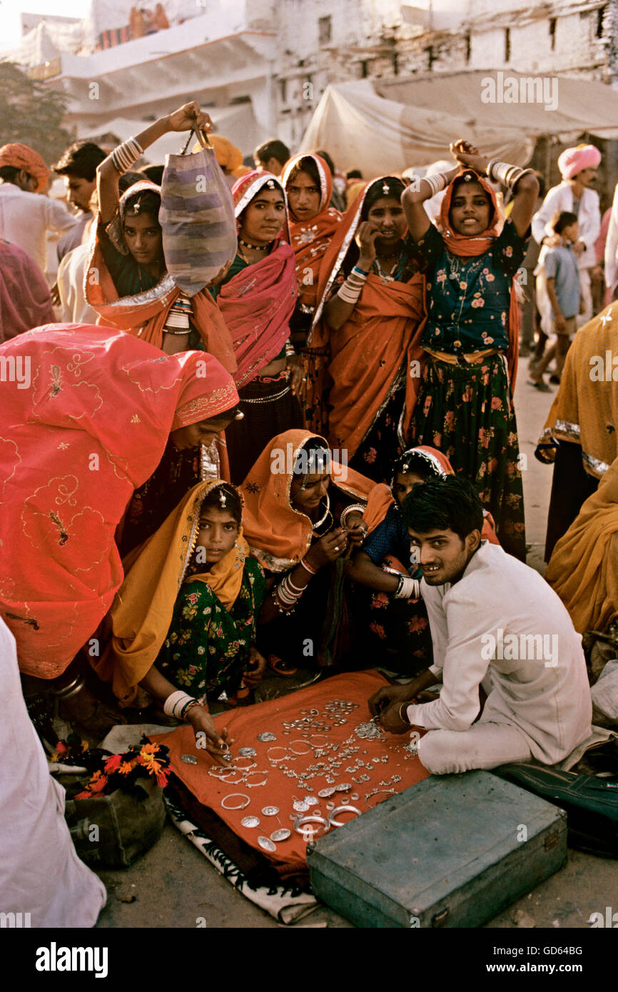 Women buying trinkets Stock Photo - Alamy