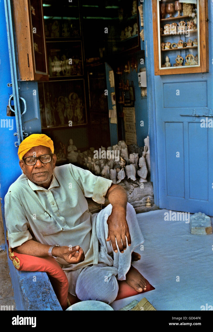 Merchant outside shop Stock Photo - Alamy