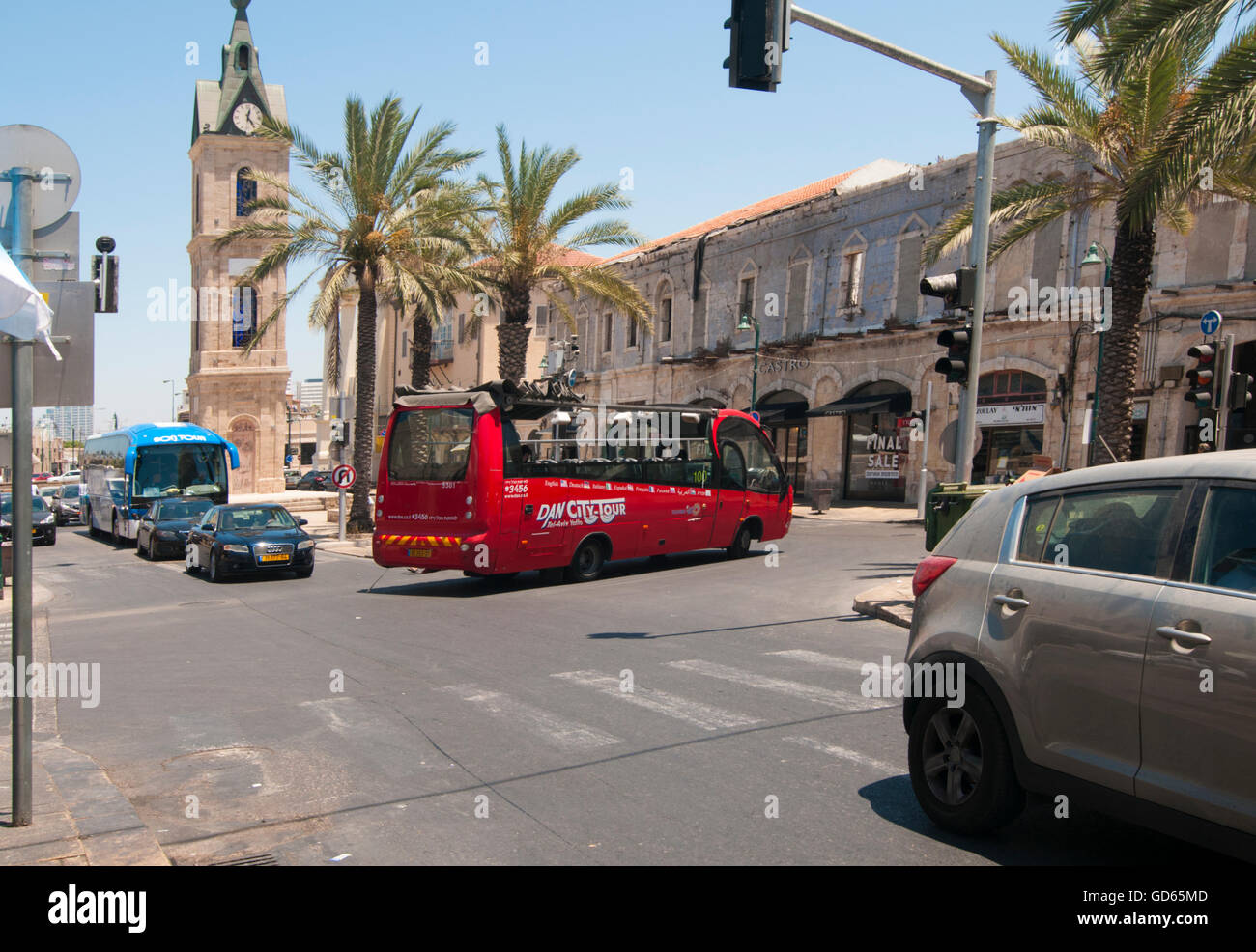 The red open roof tourist bus for sightseeing the city. passes the ...