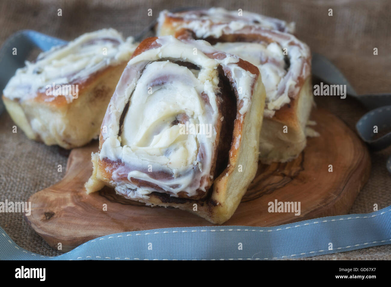 Cinnamon iced buns Stock Photo - Alamy