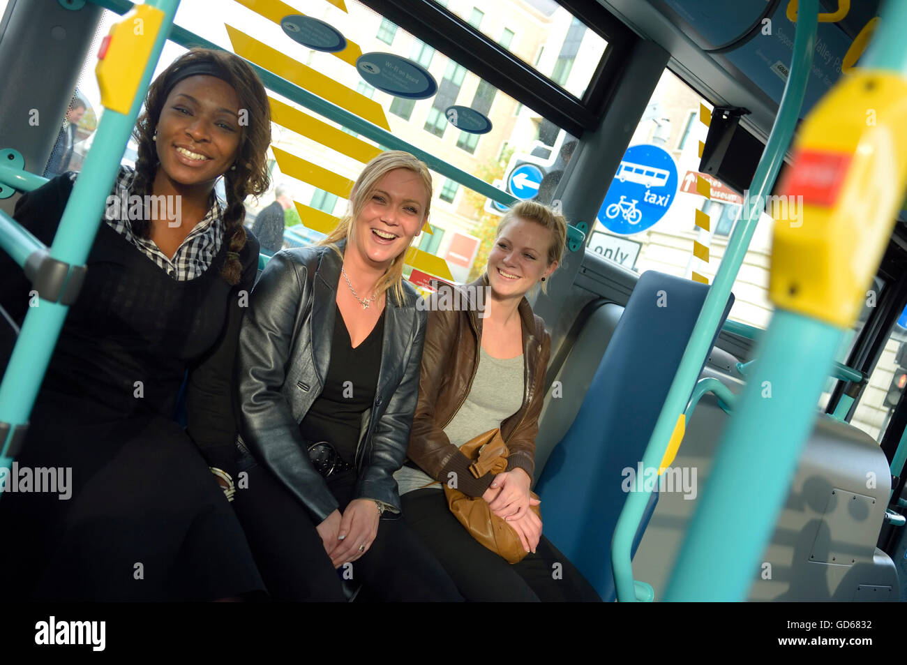 A group of women traveling on a bus. England. UK Stock Photo - Alamy