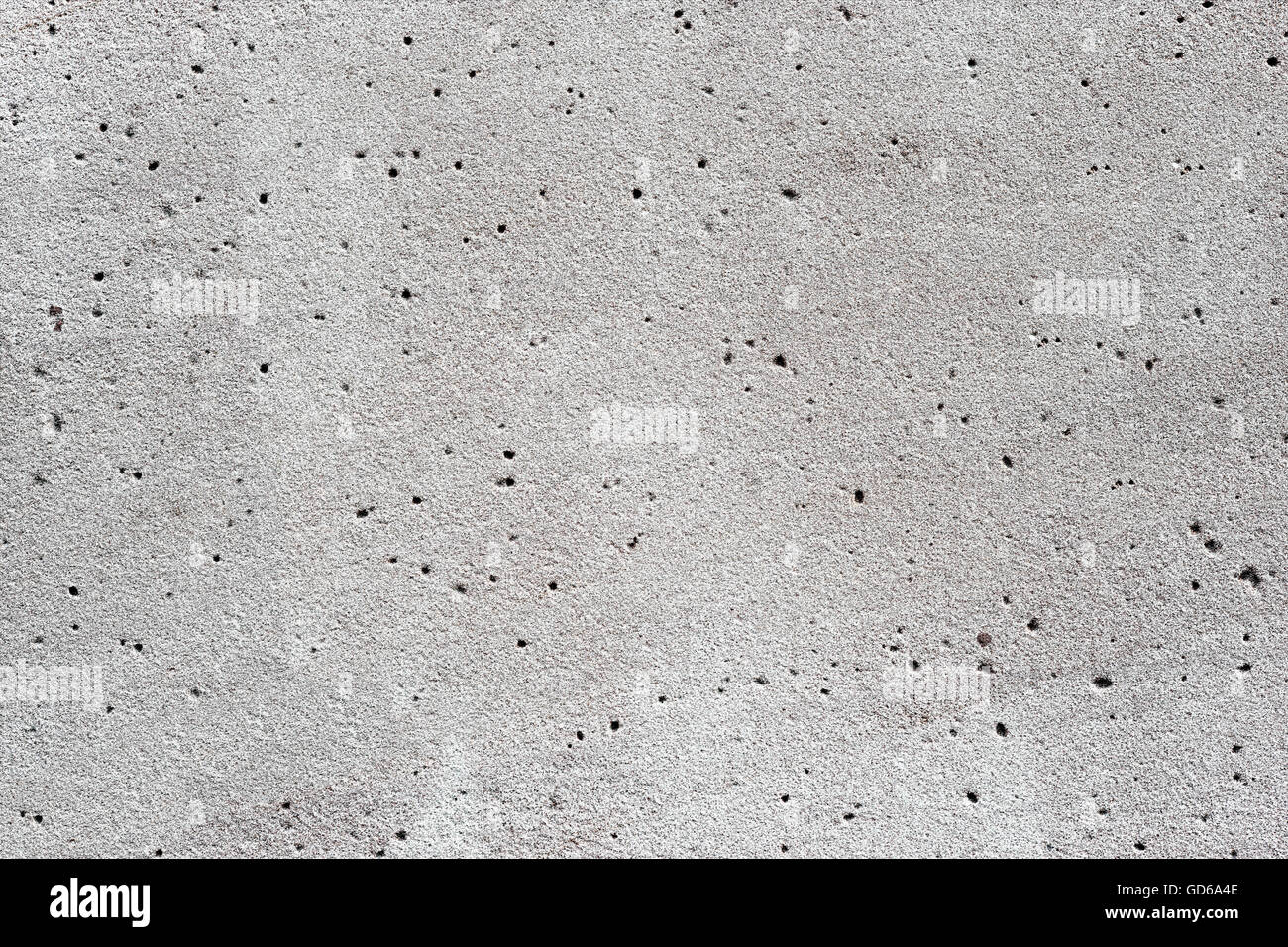 Light-colored sandstone with small holes as wallpaper Stock Photo - Alamy
