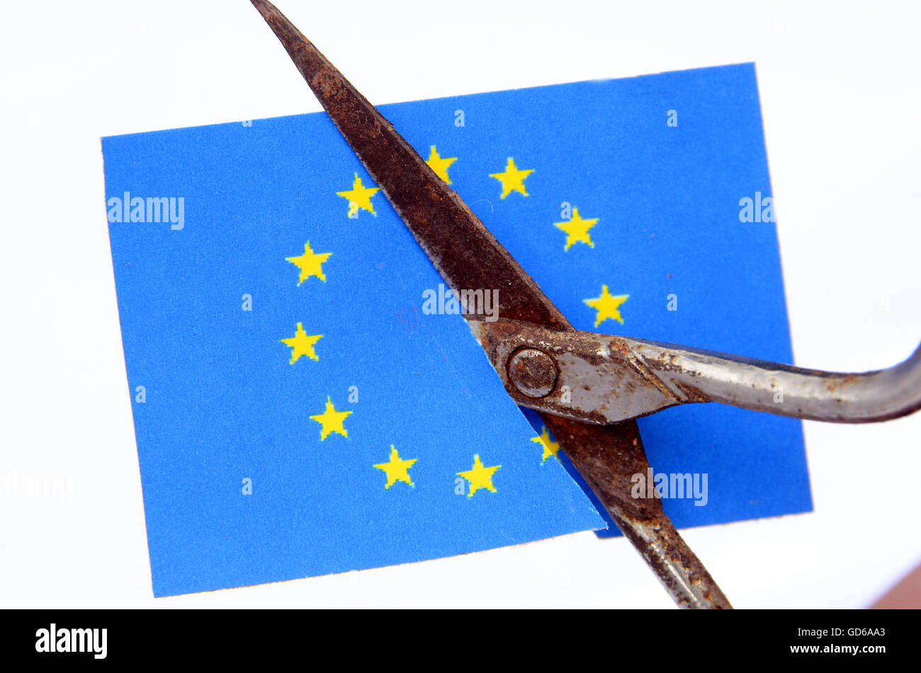 EU Flag being cut with rusty scissors Stock Photo - Alamy