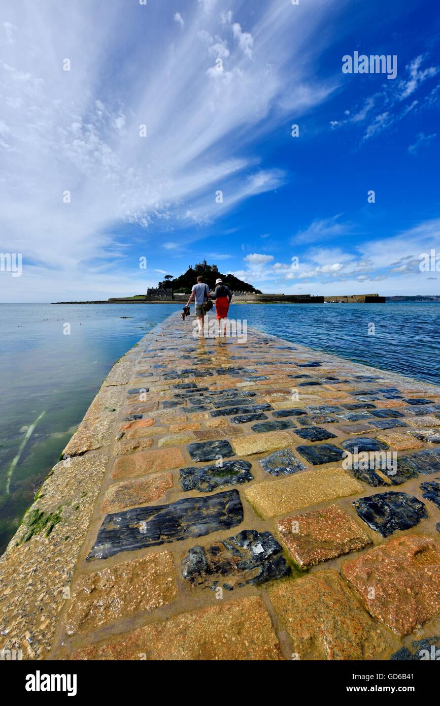 Tourists on the stone causeway leading to St Michael's Mount and Mounts ...