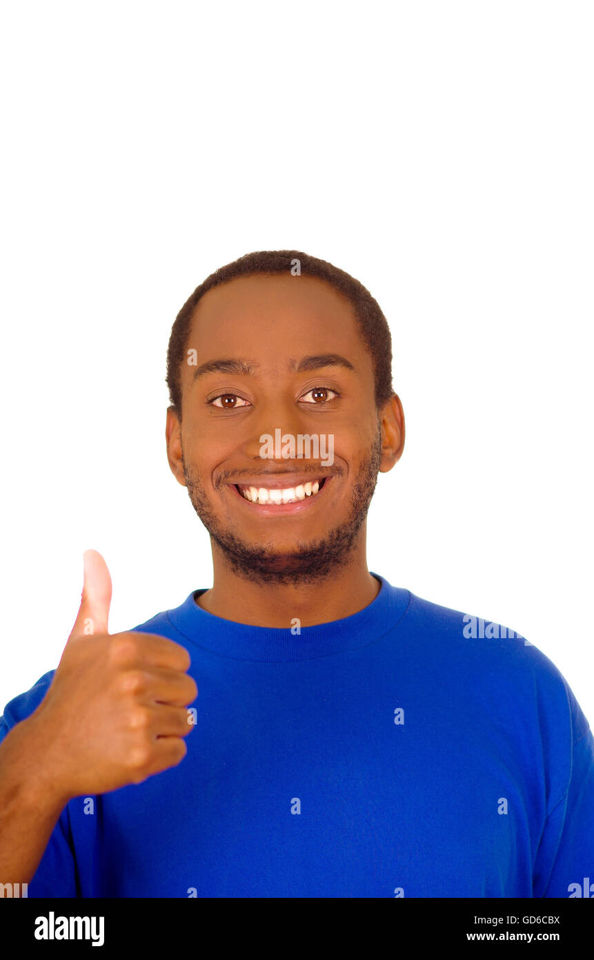 Headshot handsome man wearing strong blue colored t-shirt and giving ...