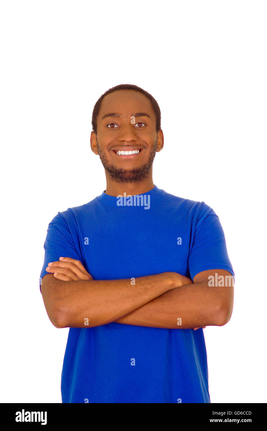 Man wearing strong blue t-shirt standing and laughing hard holding his ...