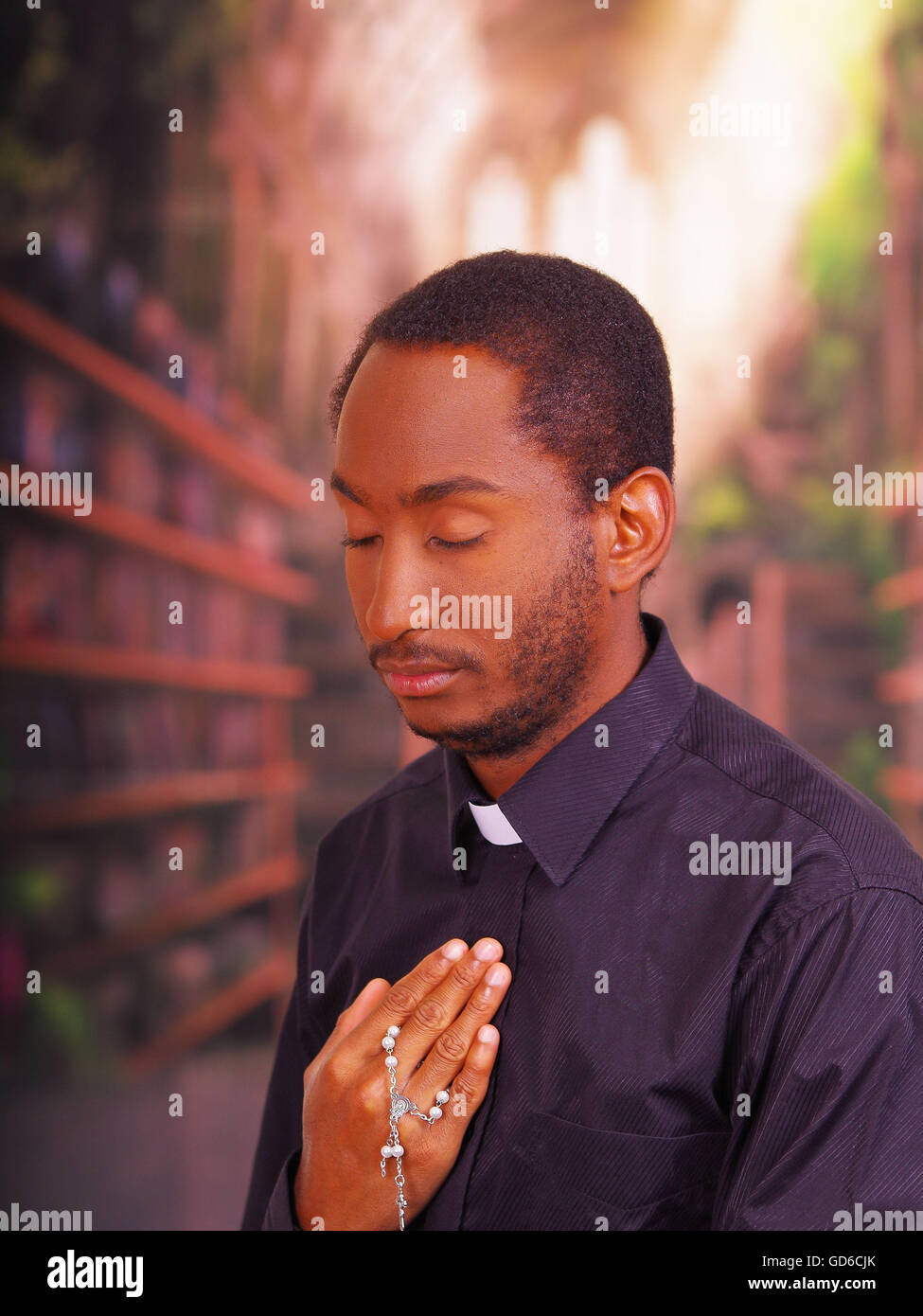 Catholic priest wearing traditional clerical collar shirt standing ...