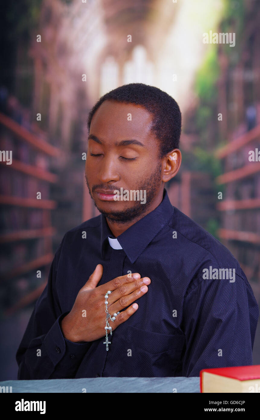 Catholic priest wearing traditional clerical collar shirt standing ...