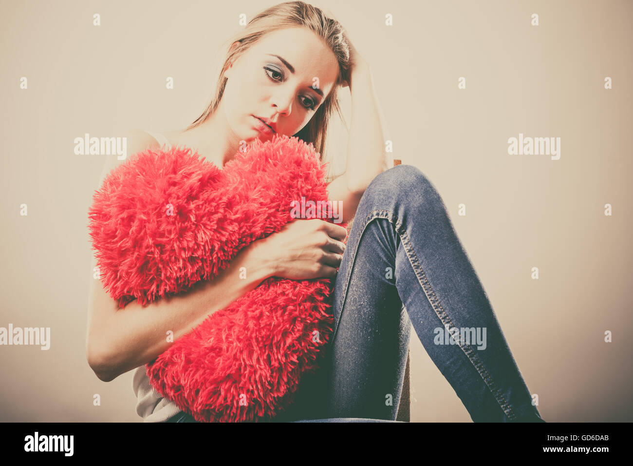 Upset lonely woman hugging pillow hi-res stock photography and images ...