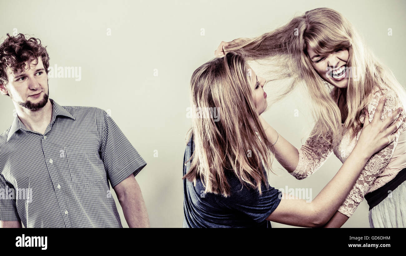 Man women jealous fight over hi-res stock photography and images - Alamy