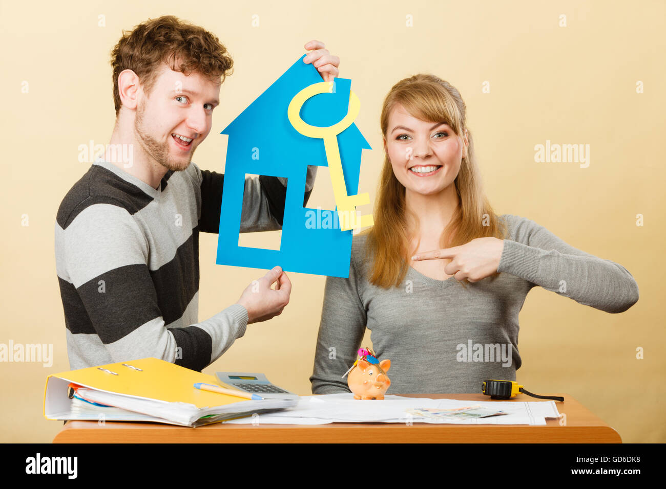 Project and design concept. Couple young marriage with model of their ...