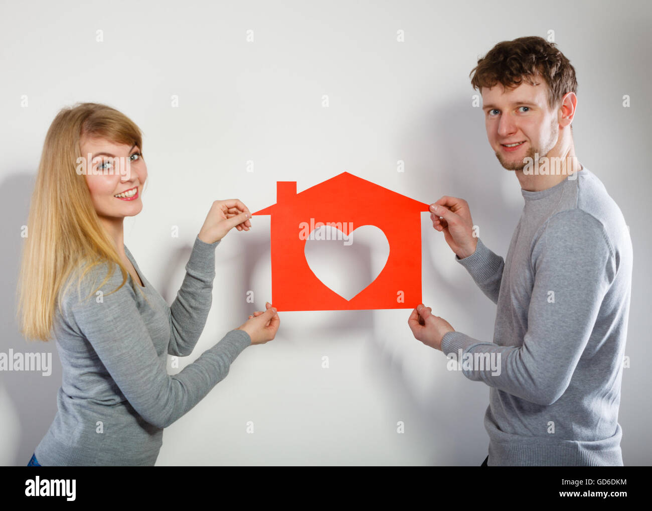 Life together. First big step in relationship. Young smiling couple in ...