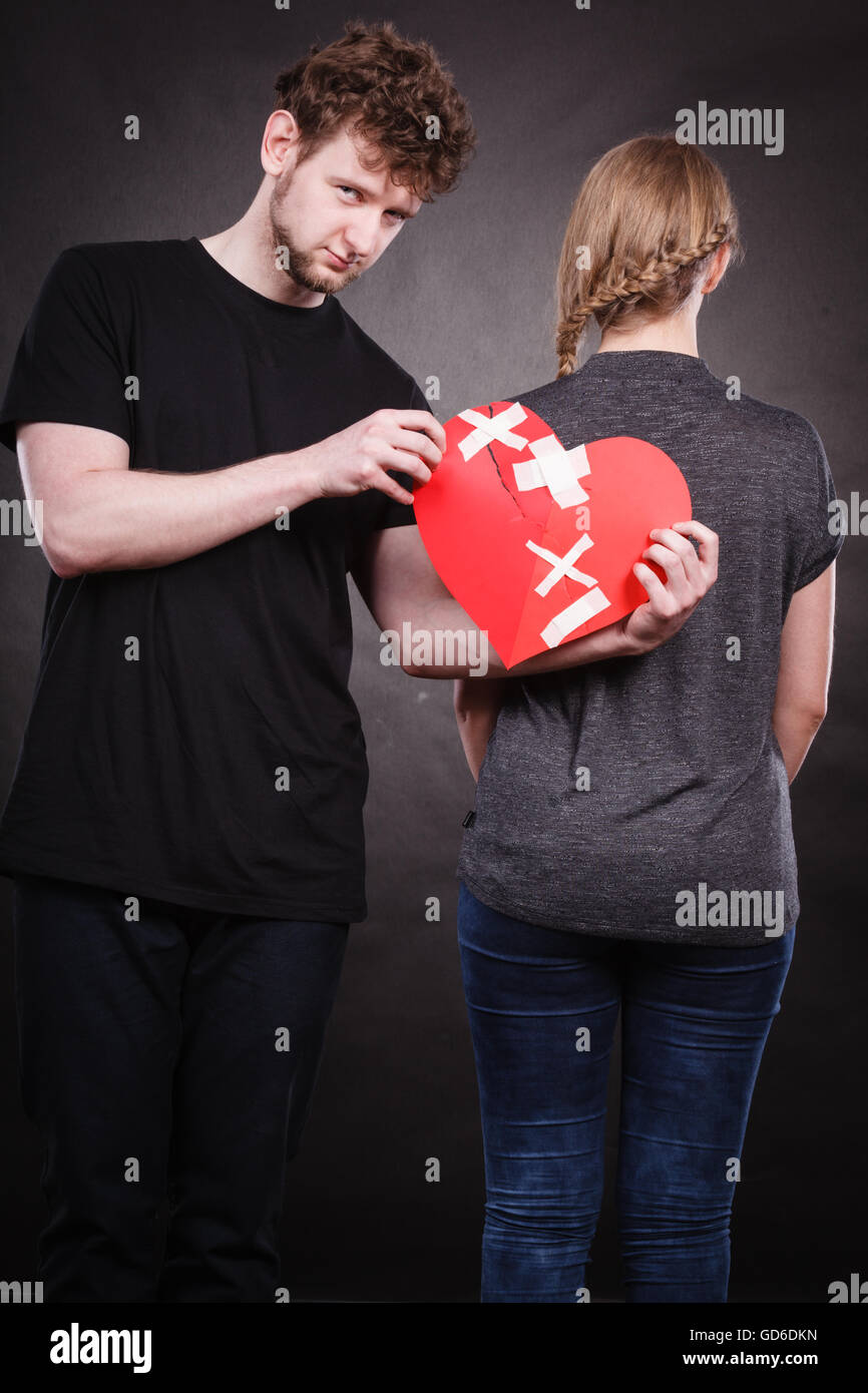 Broken heart difficult love concept. Sad unhappy couple woman and man ...