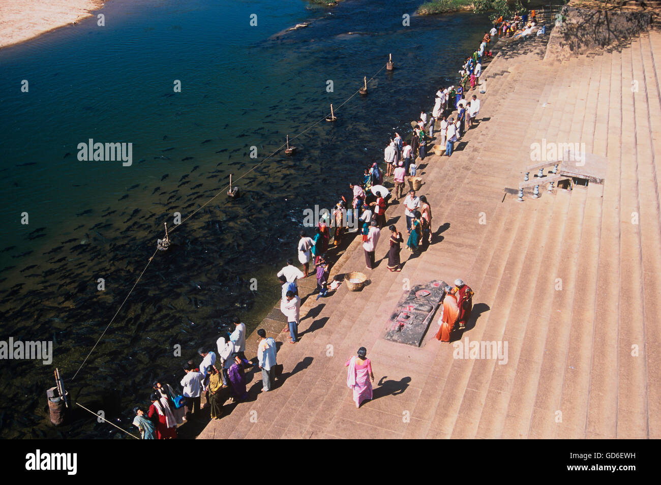 Pilgrims at Tunga river Stock Photo - Alamy