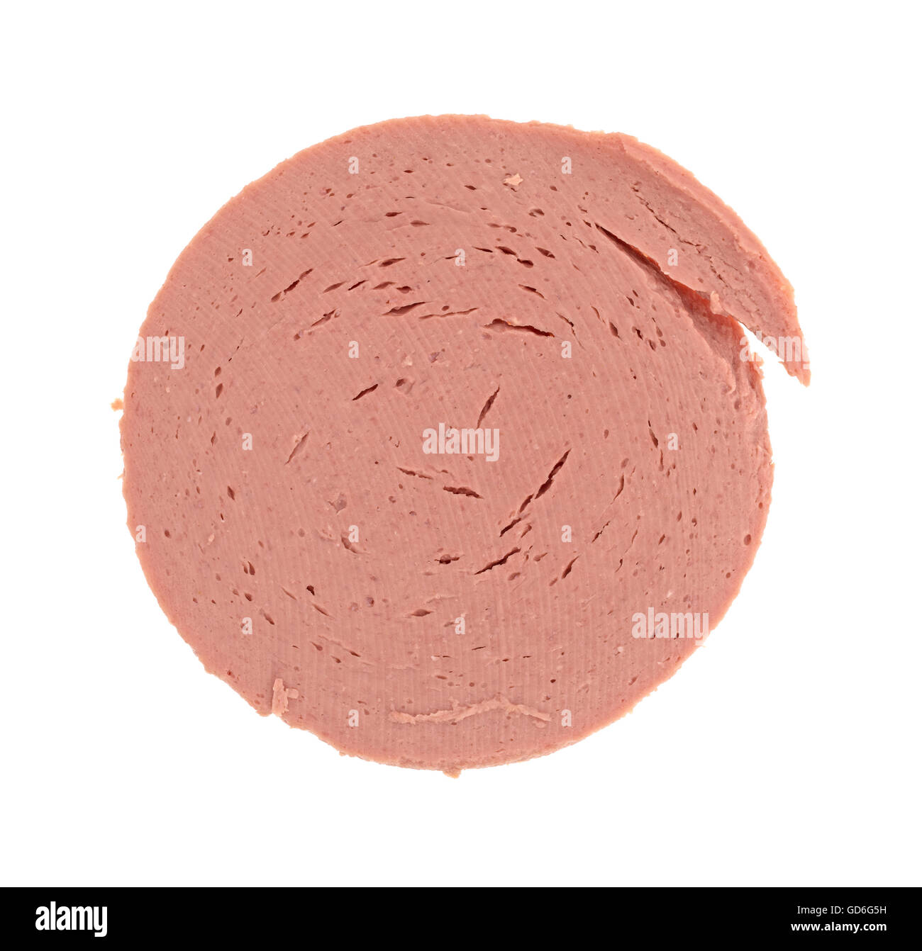 Single slice of chicken bologna with a torn edge on a white background ...