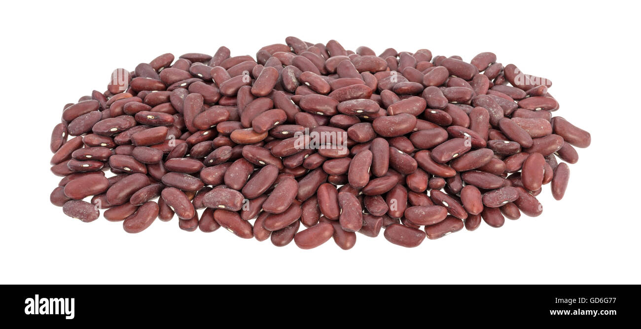 A large portion of dark red organic kidney beans isolated on a white ...